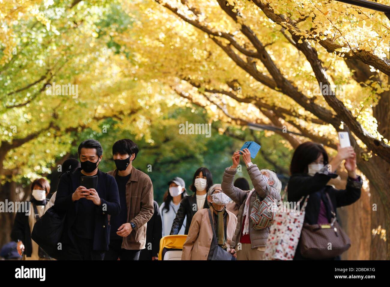 Tokyo, Japan. 17th November, 2020. Pedestrians wearing face masks to ...