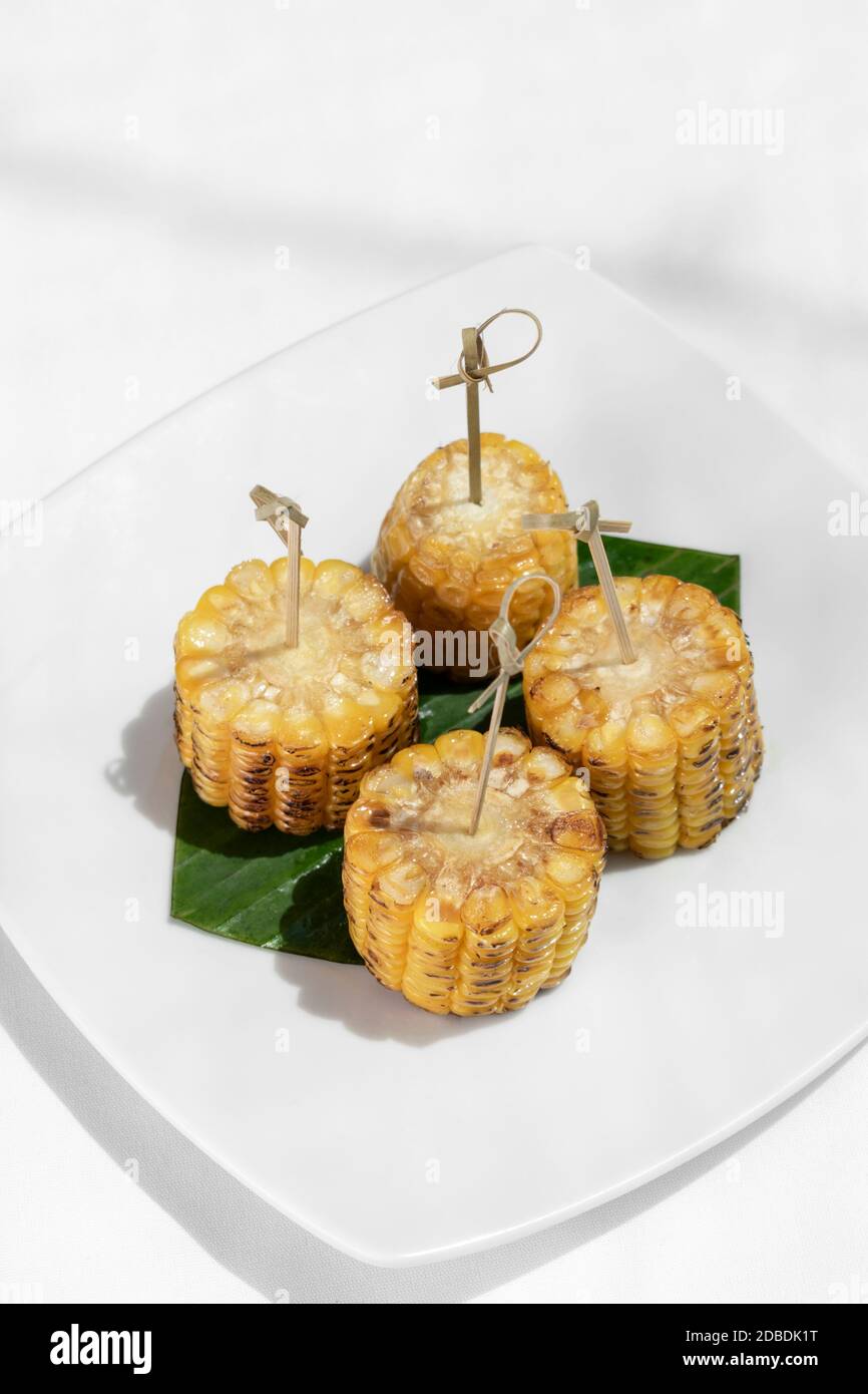 sweet corn on the cob vegetarian tapas snack food Stock Photo - Alamy