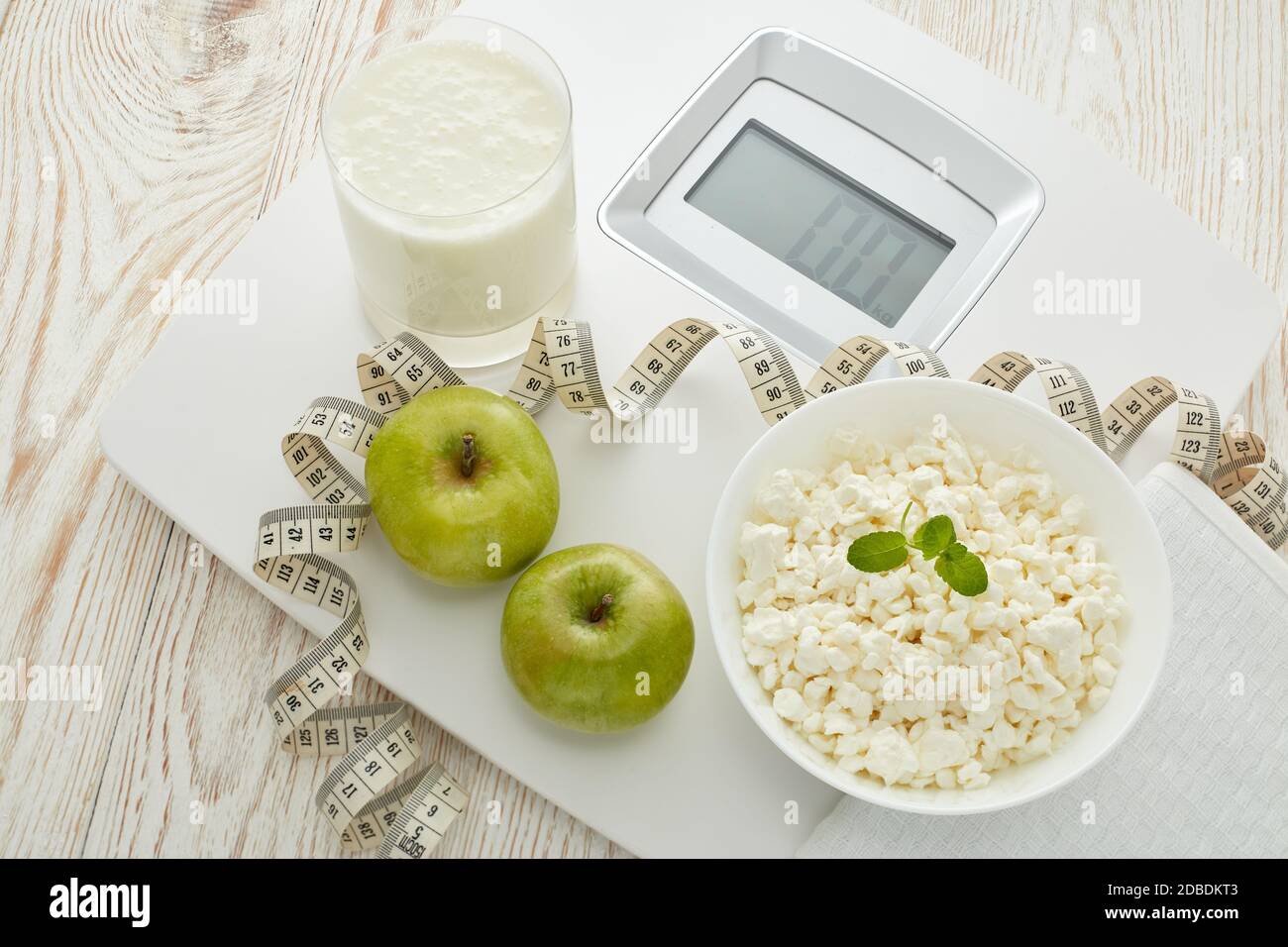 Slimming, diet, and control of weight. Still life with healthy food ...