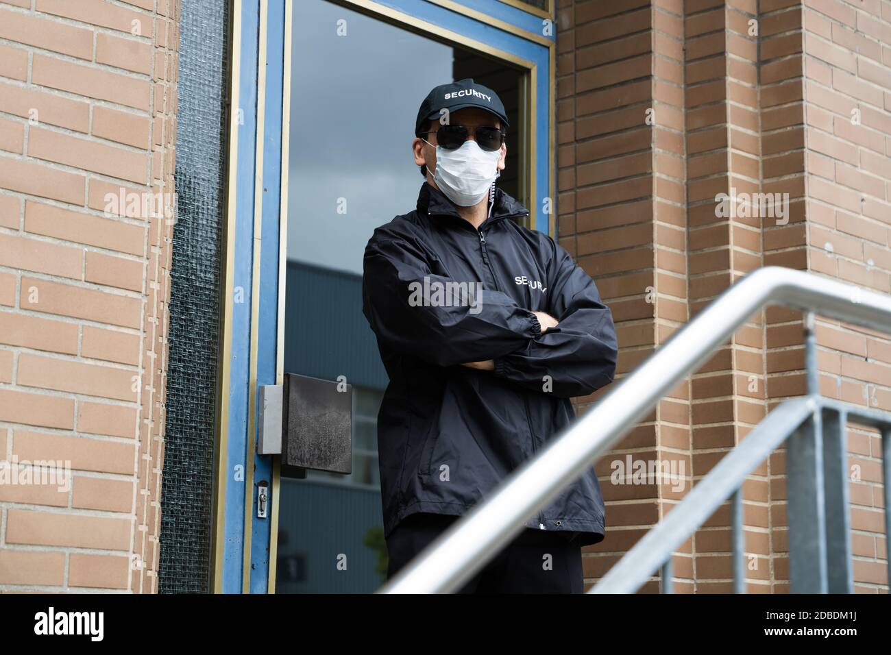 Security guard in office entrance hi-res stock photography and images ...