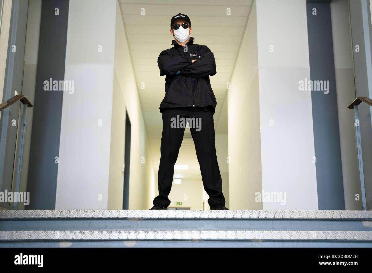 Security guard in office entrance hi-res stock photography and images ...