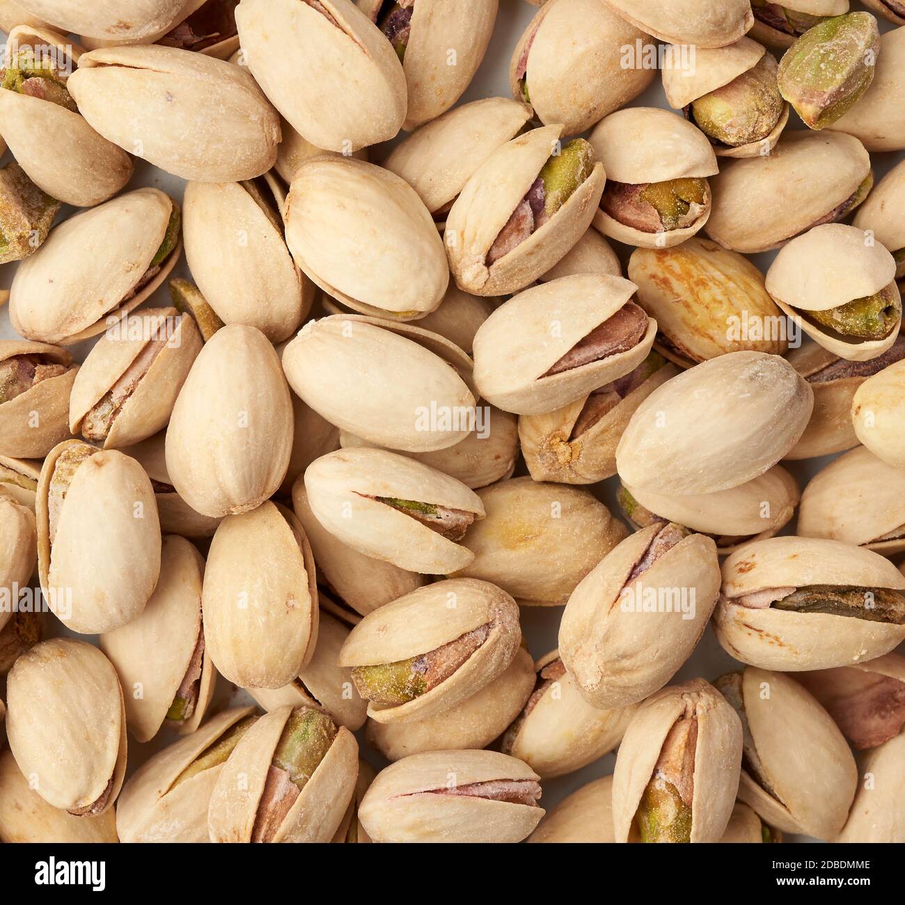 fried salted pistachios texture, top view. Roasted salted pistachio nuts Stock Photo - Alamy