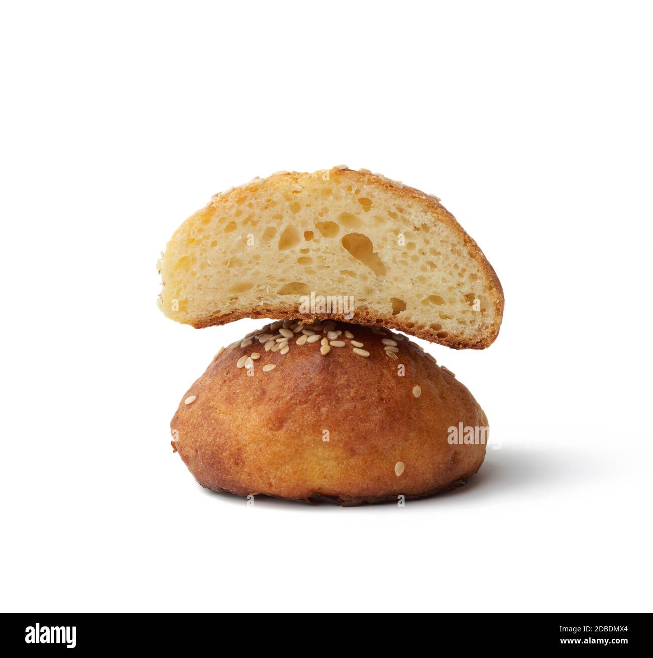 baked round bun with sesame seeds isolated on a white background, home ...
