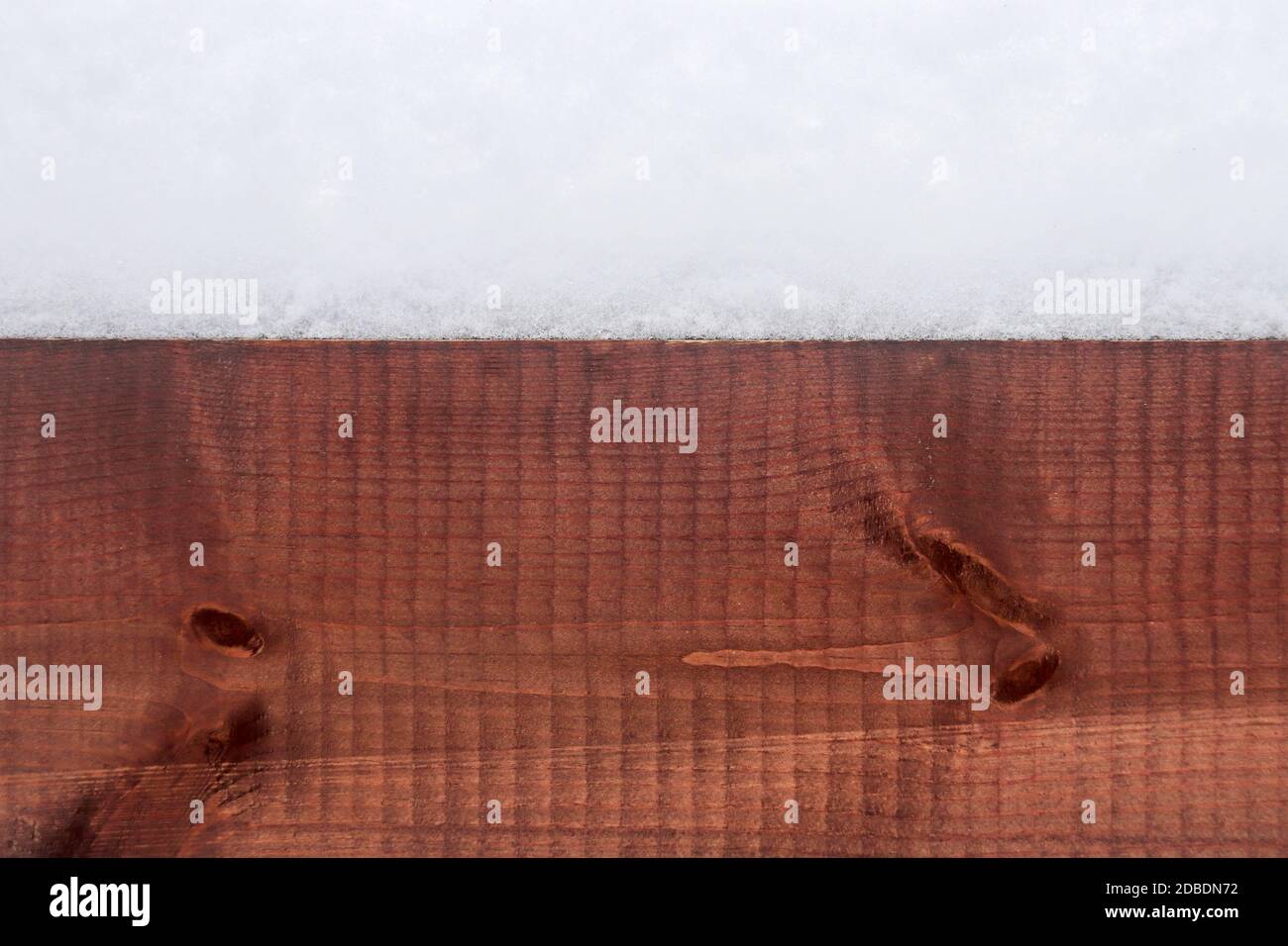 Wood plank with snowdrift Stock Photo - Alamy