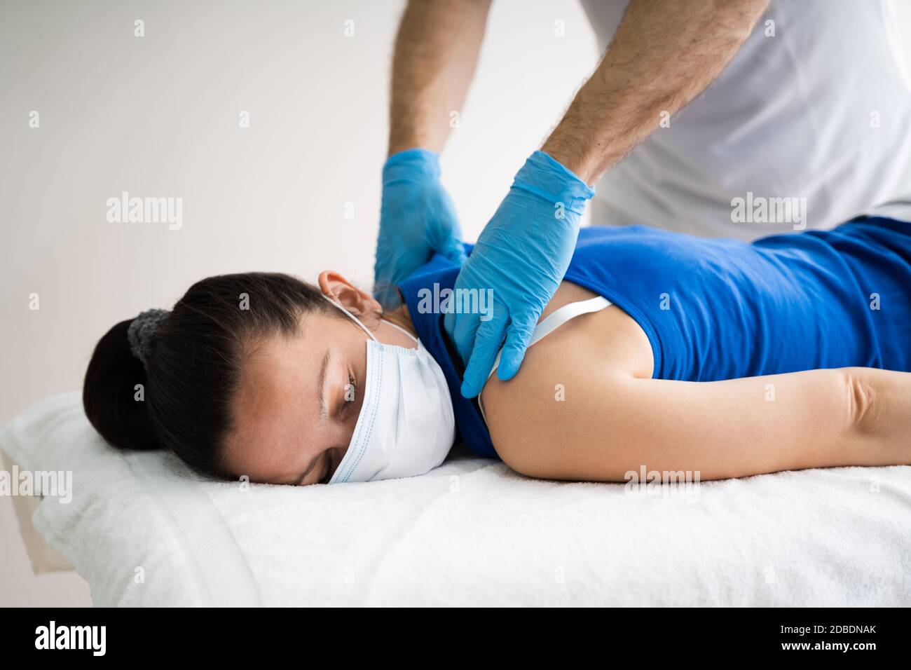 Acupressure Massage And Physio Pain Therapy In Face Mask Stock Photo ...