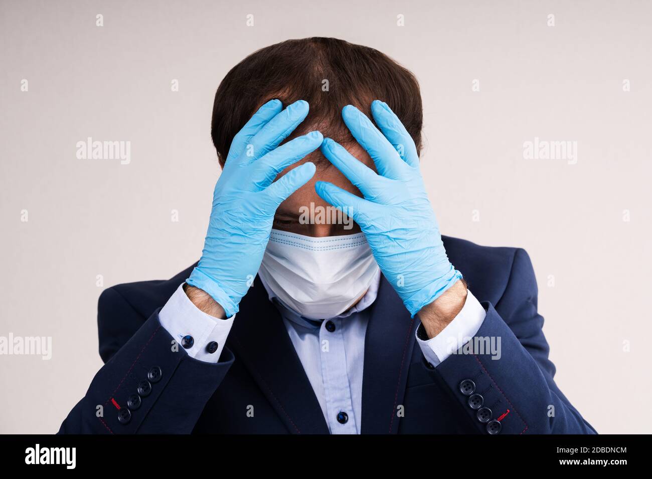 Man In Mask Suffering From Panic Attack And Shortness Of Breath Stock ...