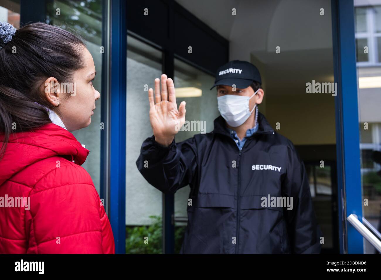 Woman in protect uniform gun hi-res stock photography and images - Alamy