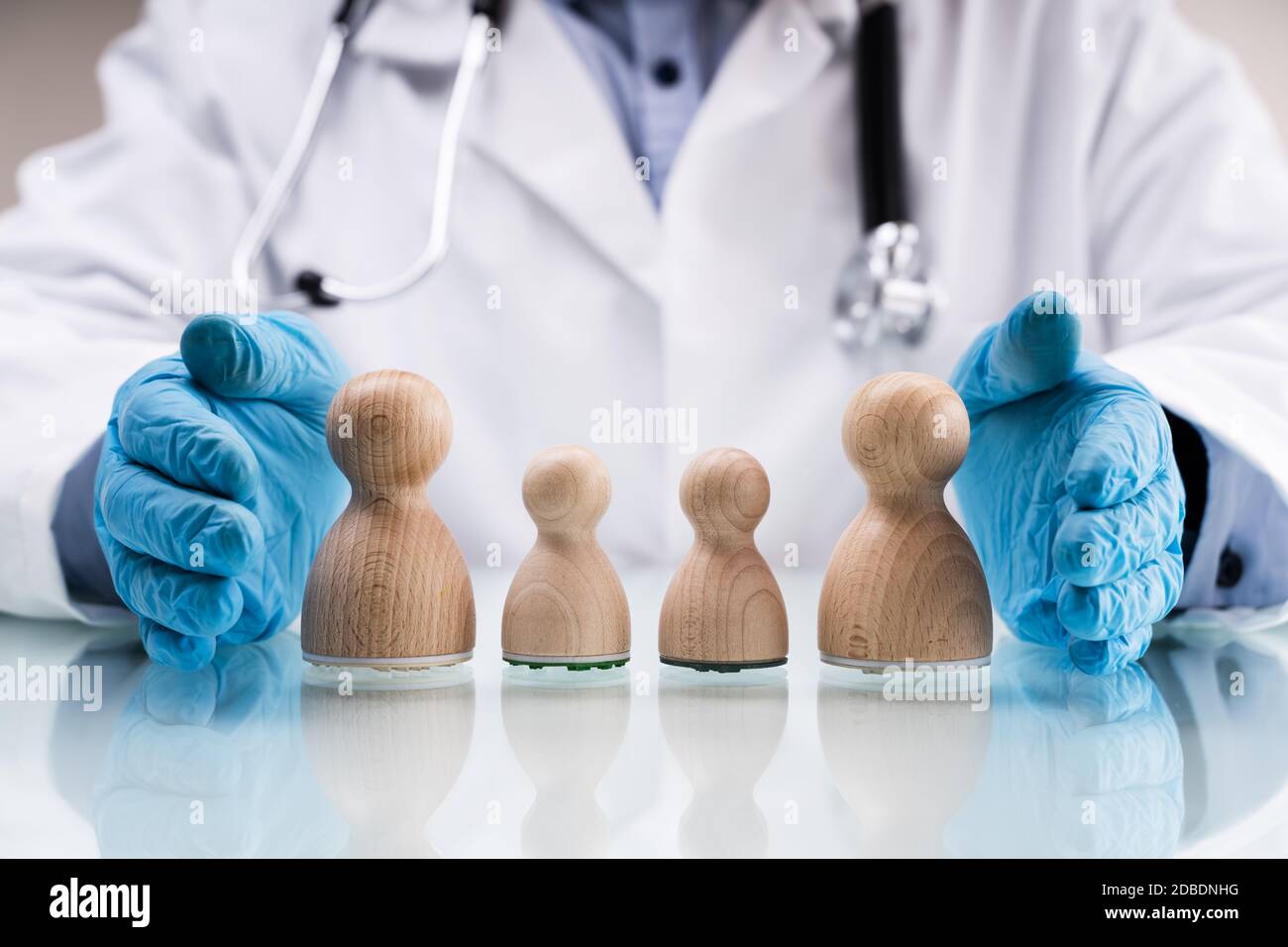 Medical And Health Insurance Doctor Covering Family Stock Photo - Alamy