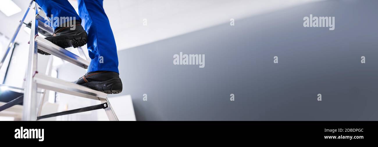 Man In Shoes On Step Ladder. Work Safety Stock Photo - Alamy