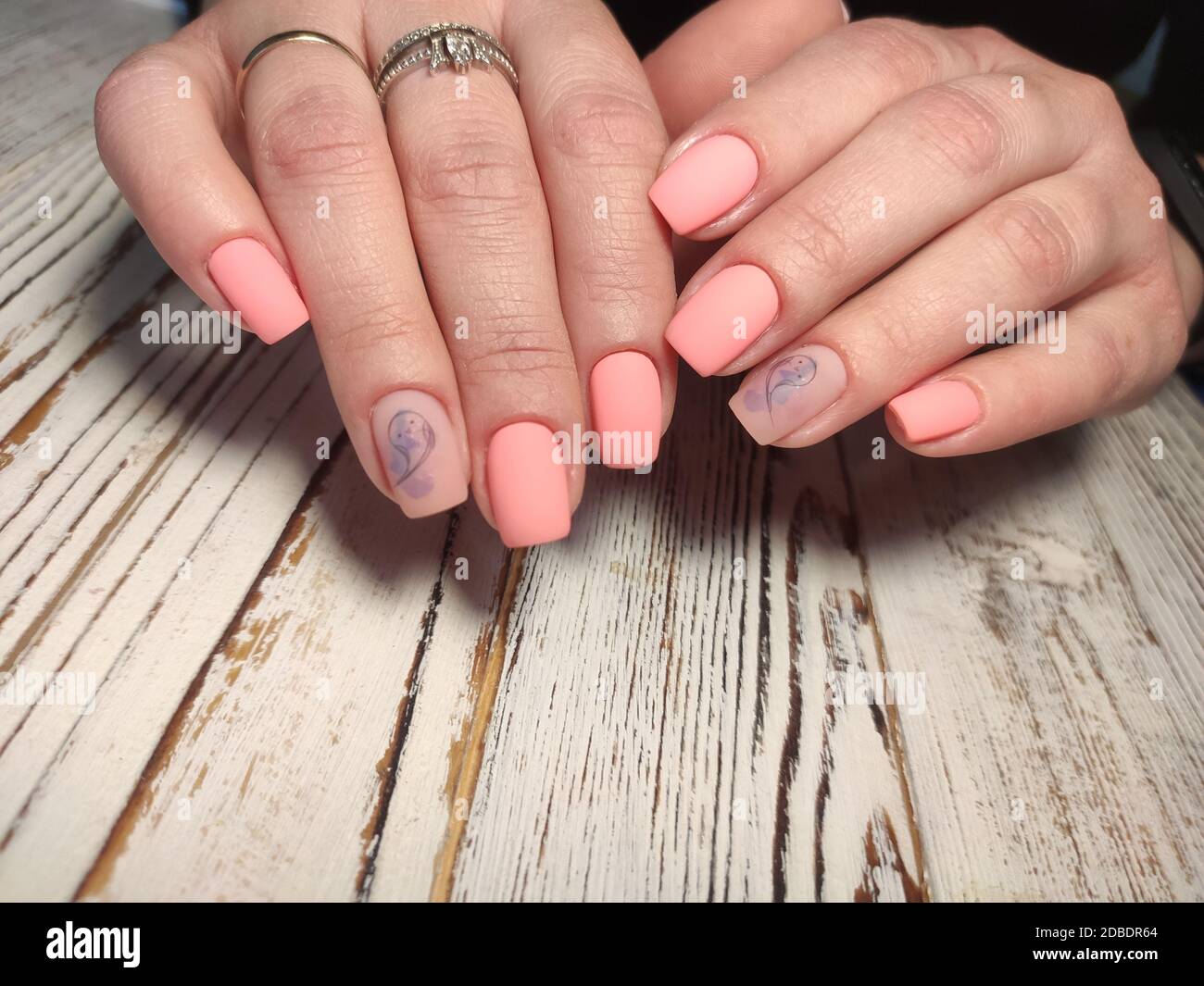 beautiful manicure of nails on the background of a fashionable texture ...