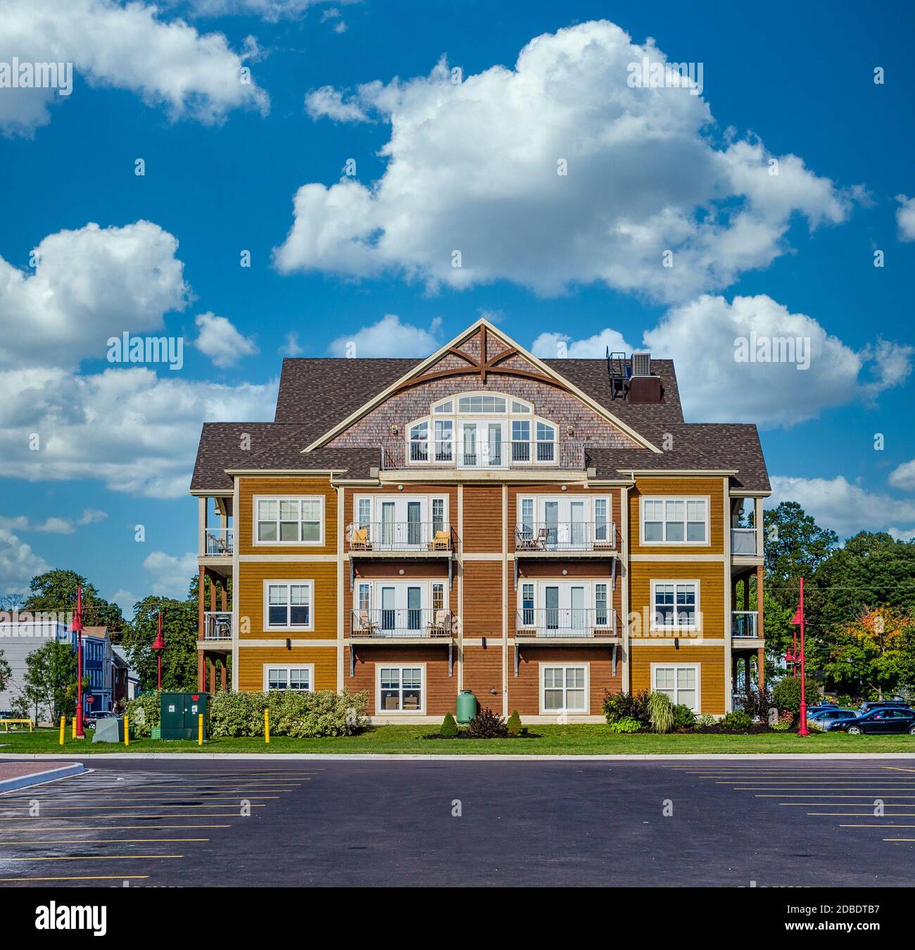 Small Condo Building Under Blue Skies in Canada Stock Photo - Alamy