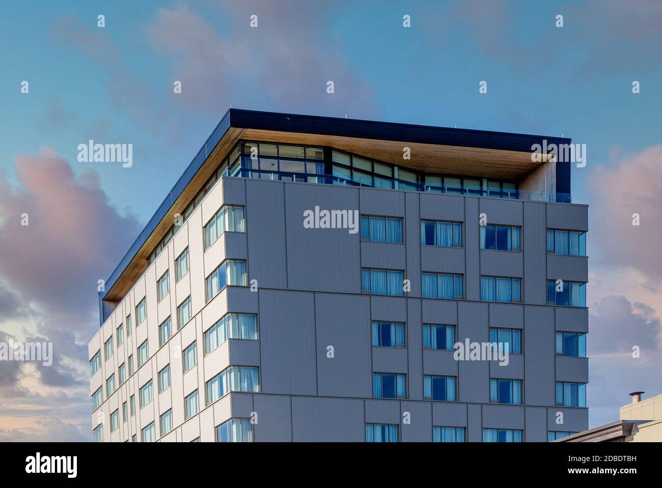 Penthouse on Square Condo Building on Blue Sky Stock Photo - Alamy