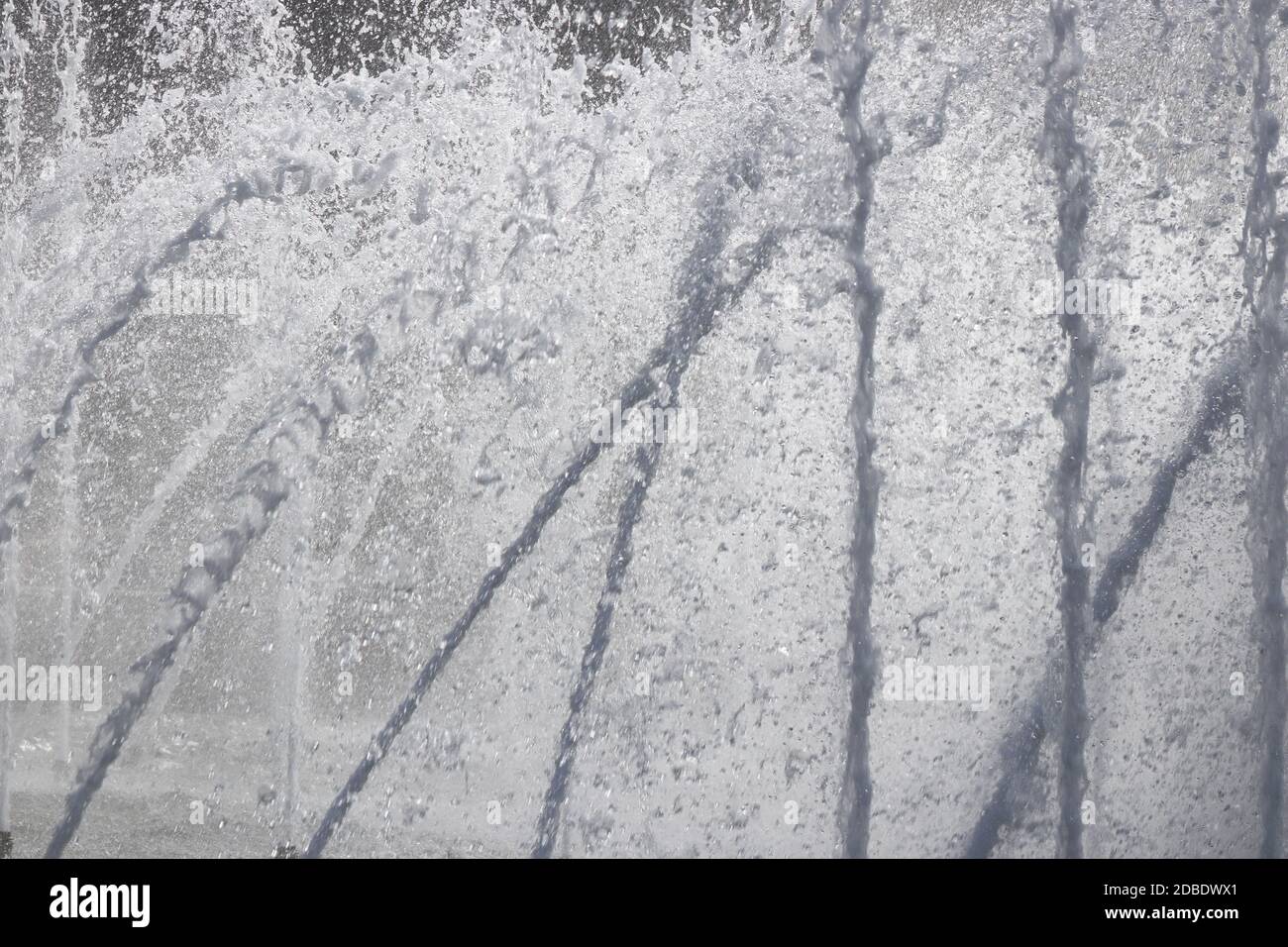 Fountain water streams dynamic motion. Wet spray summer waterfall Stock ...