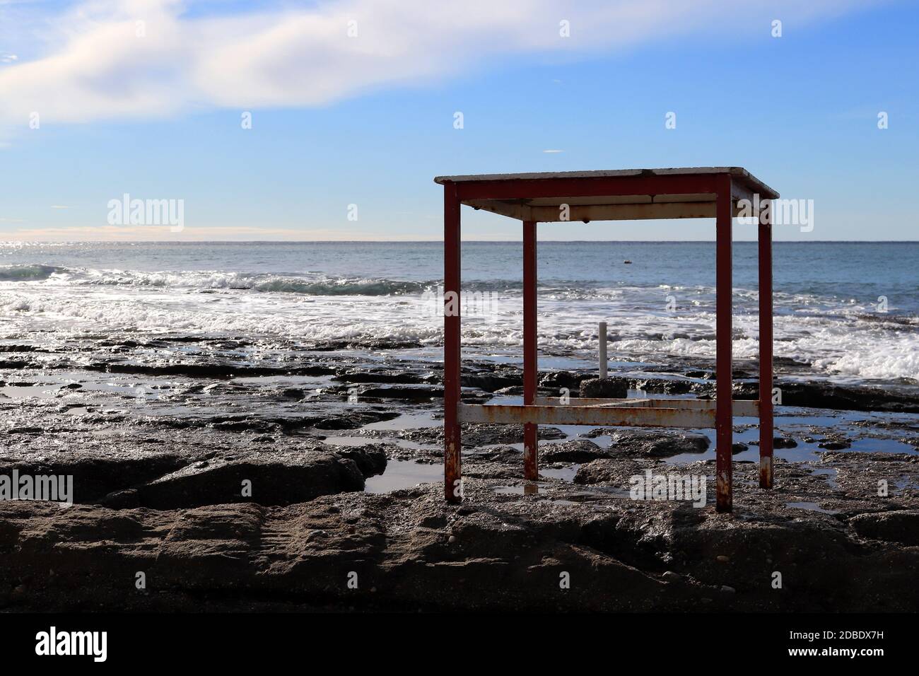 Table on a cliff near sea Stock Photo - Alamy