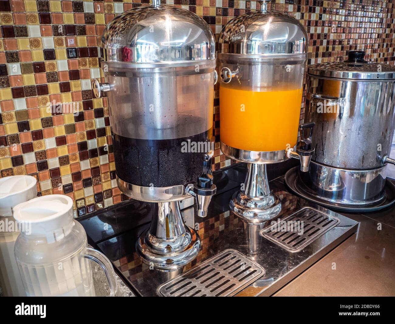 Fruit juice dispensers and coffee & tea water on a self service ...