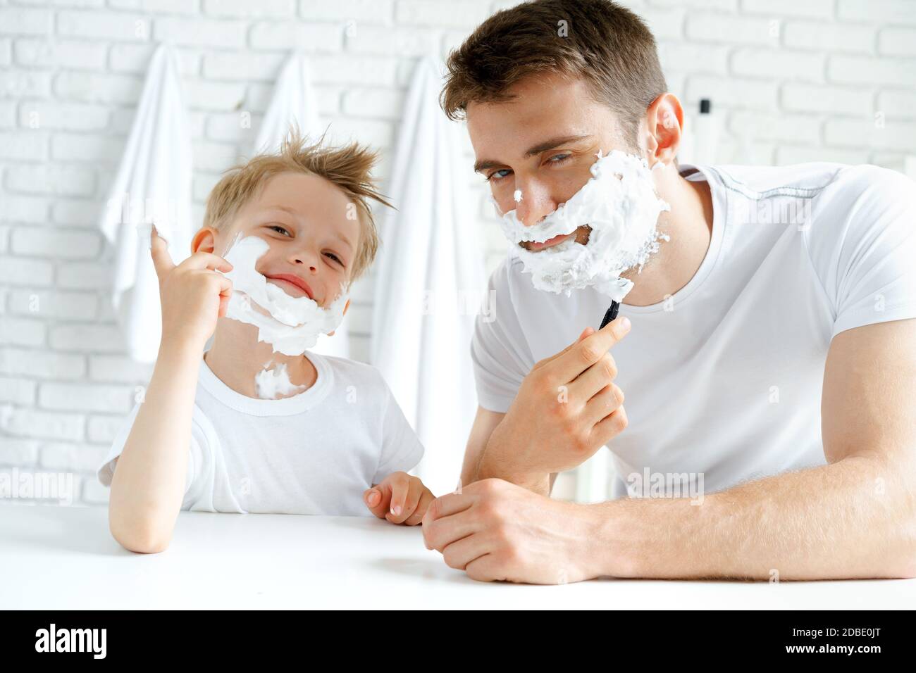 Father and his little son shaving together Stock Photo - Alamy