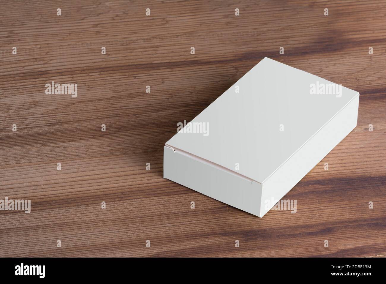 Suppositories packaging on wooden table background, editable mock up ...