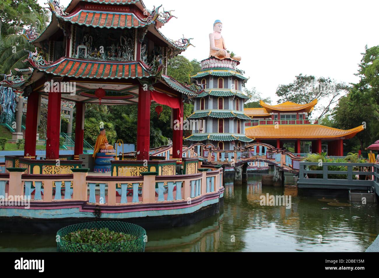 pond and pavilions at haw par villa in singapore Stock Photo - Alamy