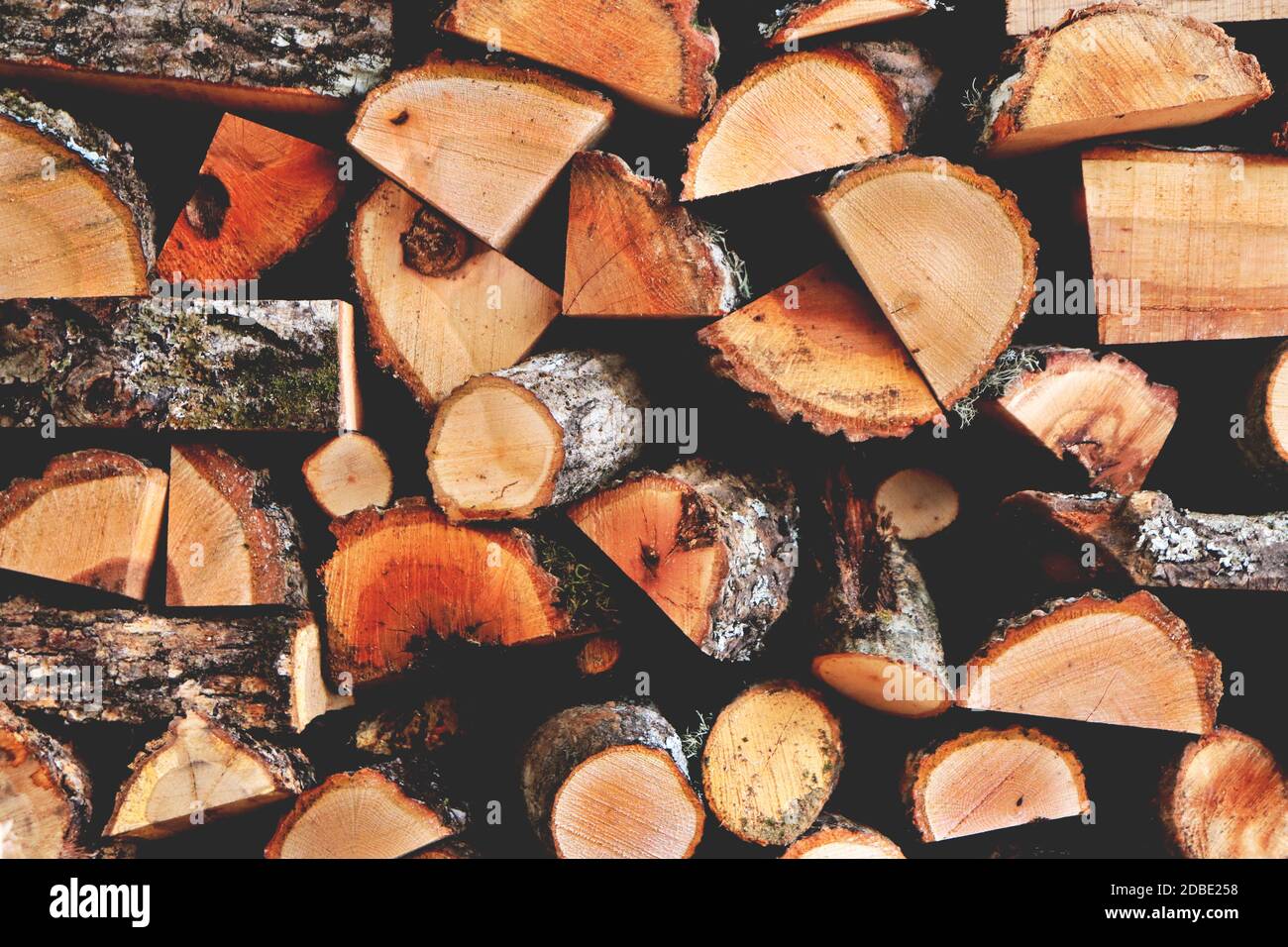 Wooden logging backdrop. Timber butts stack texture. Lumber planks pile ...