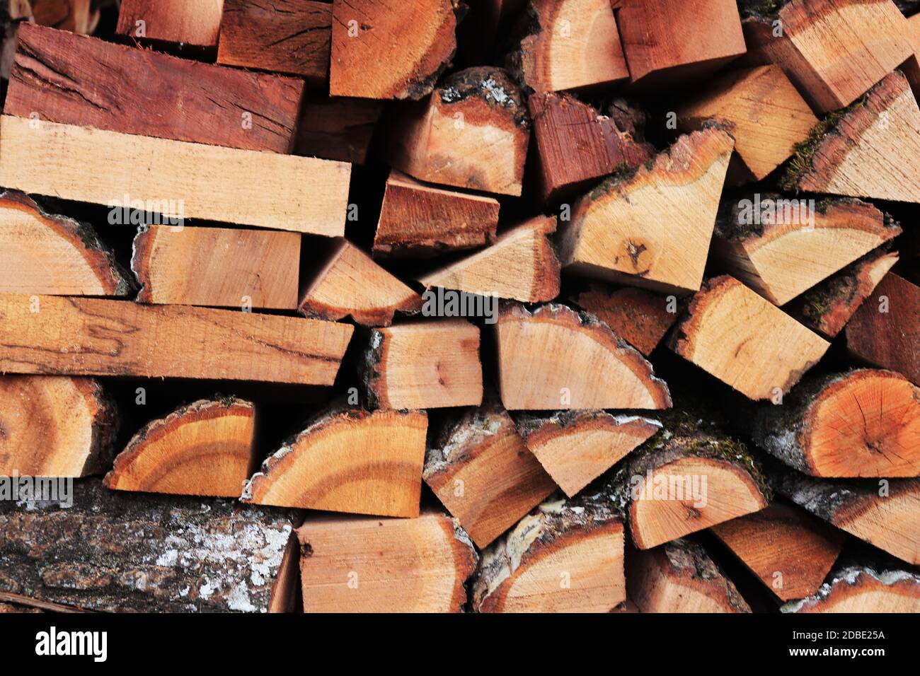 Timber butts stack texture. Lumber planks pile background. Wooden ...