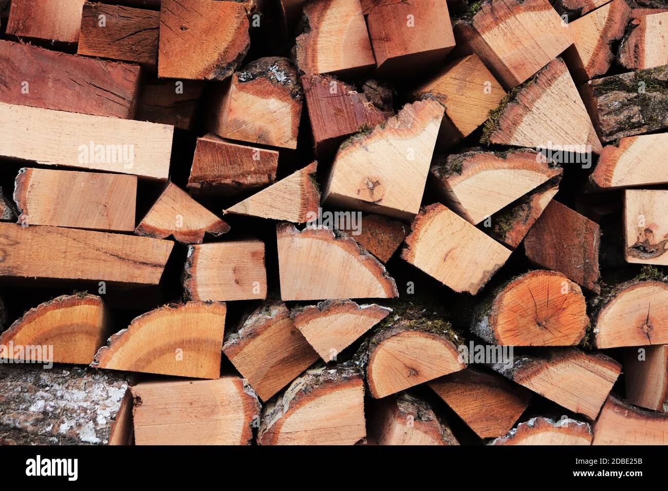 Timber butts stack texture. Lumber planks pile background. Wooden ...