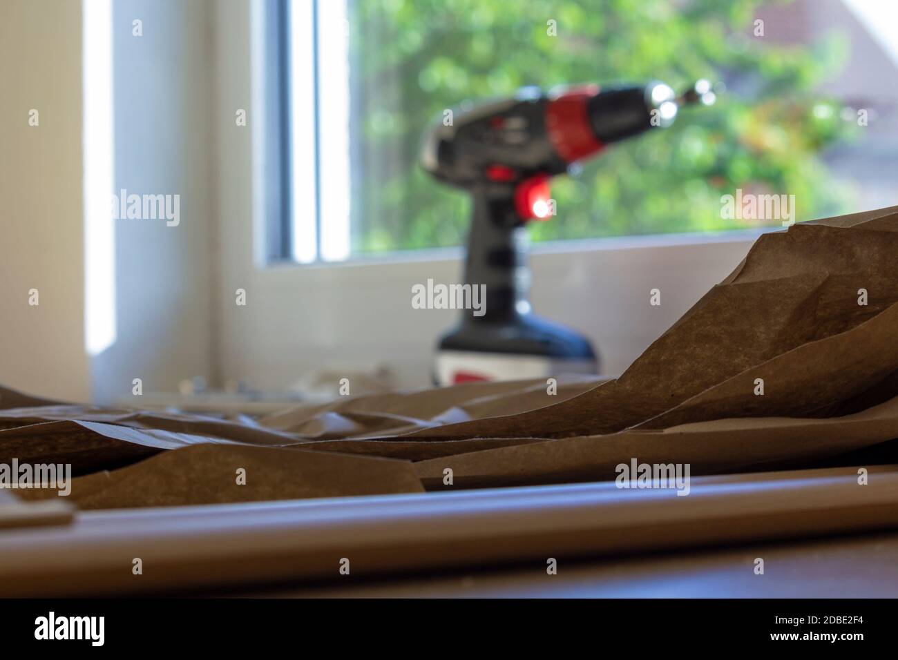 old paper remnants, which served as protection for the floor, looking ...