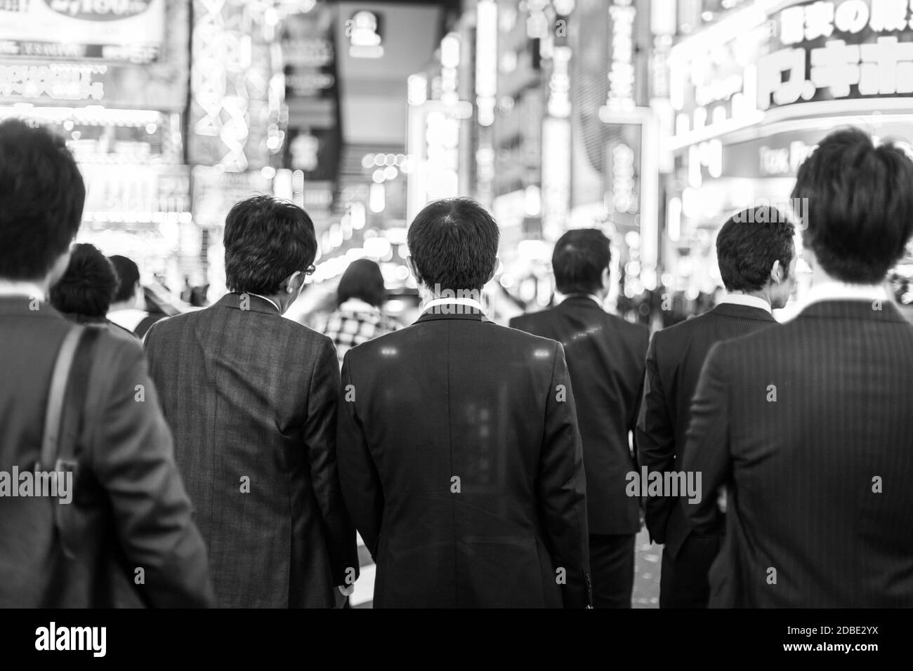 Japan suits crowd hi-res stock photography and images - Alamy