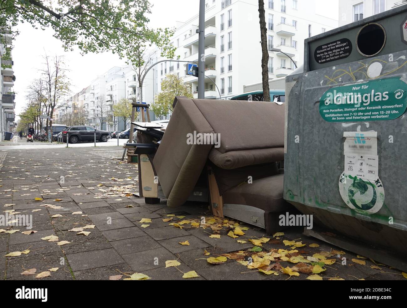 16 November 2020, Berlin: An illegally discarded couch stands by a ...