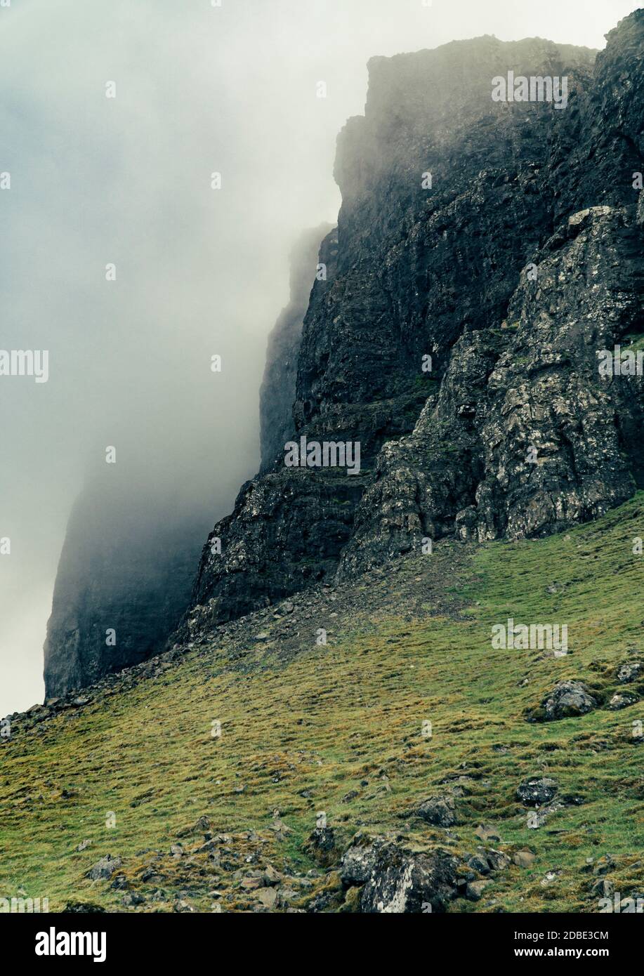 Mountains in Scotland with fog and grass in a cloudy day Stock Photo ...