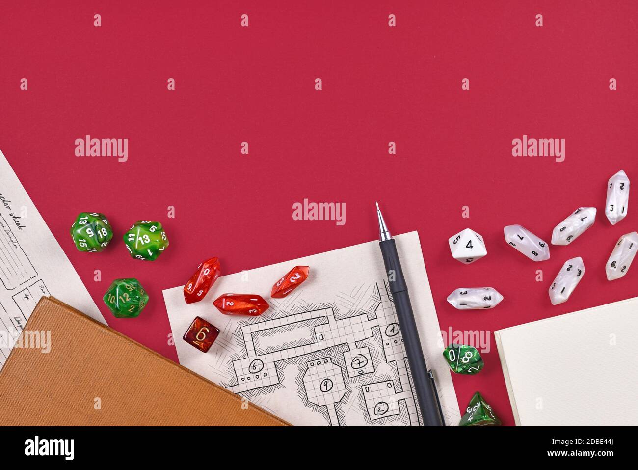 Tabletop role playing flat lay with RPG game dices, hand drawn dungeon ...