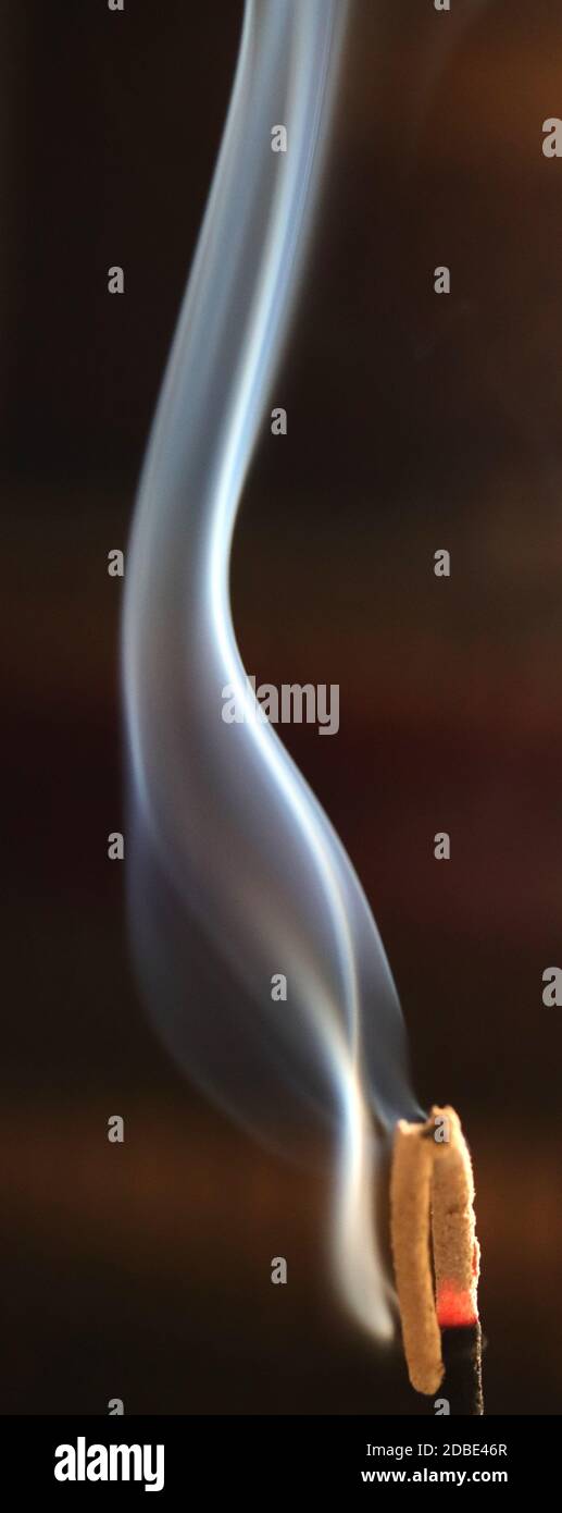 Smoke silver line from cane stick Stock Photo - Alamy