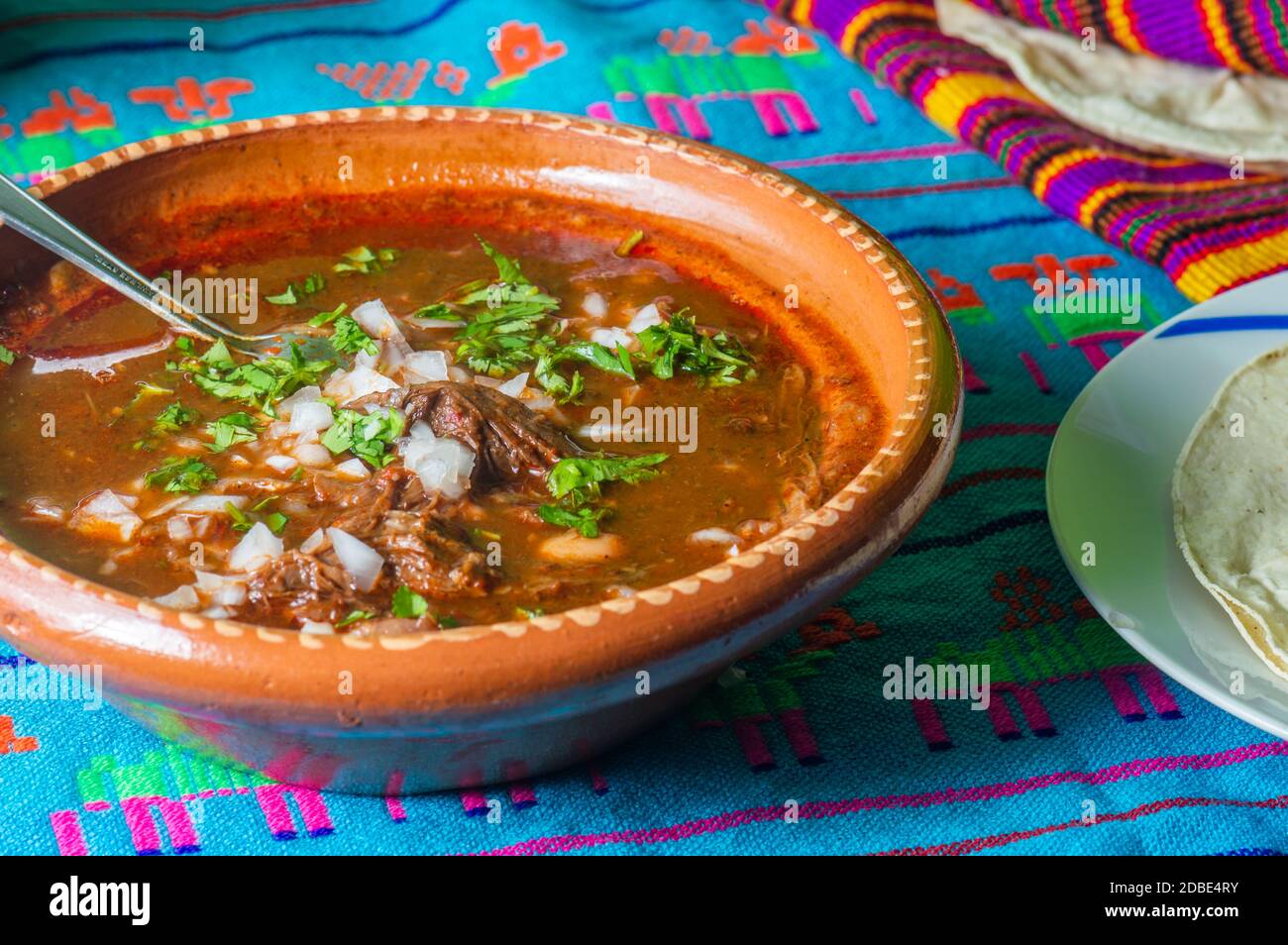 Traditional beef birria stew, Mexican food from Jalisco state. Served ...