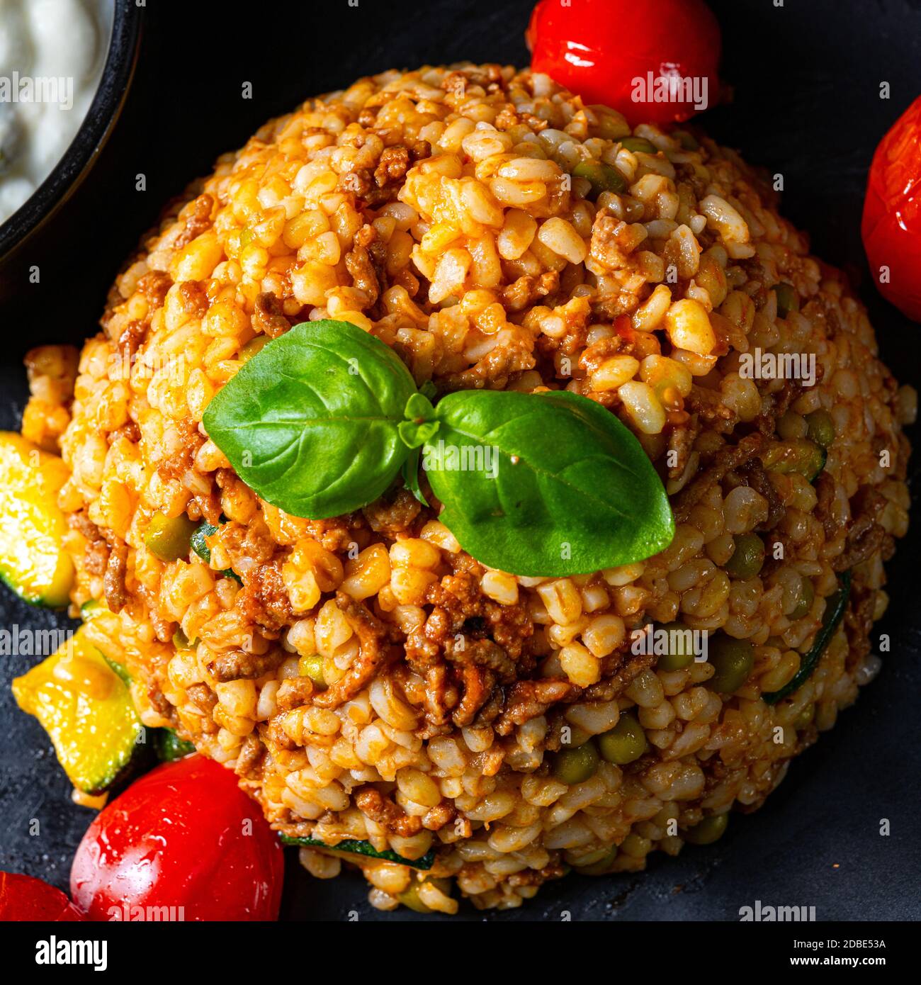 rustic bulgur fried with minced meat and vegetables Stock Photo - Alamy