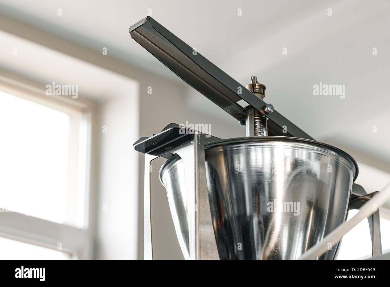 Metal squeezer hi-res stock photography and images - Alamy