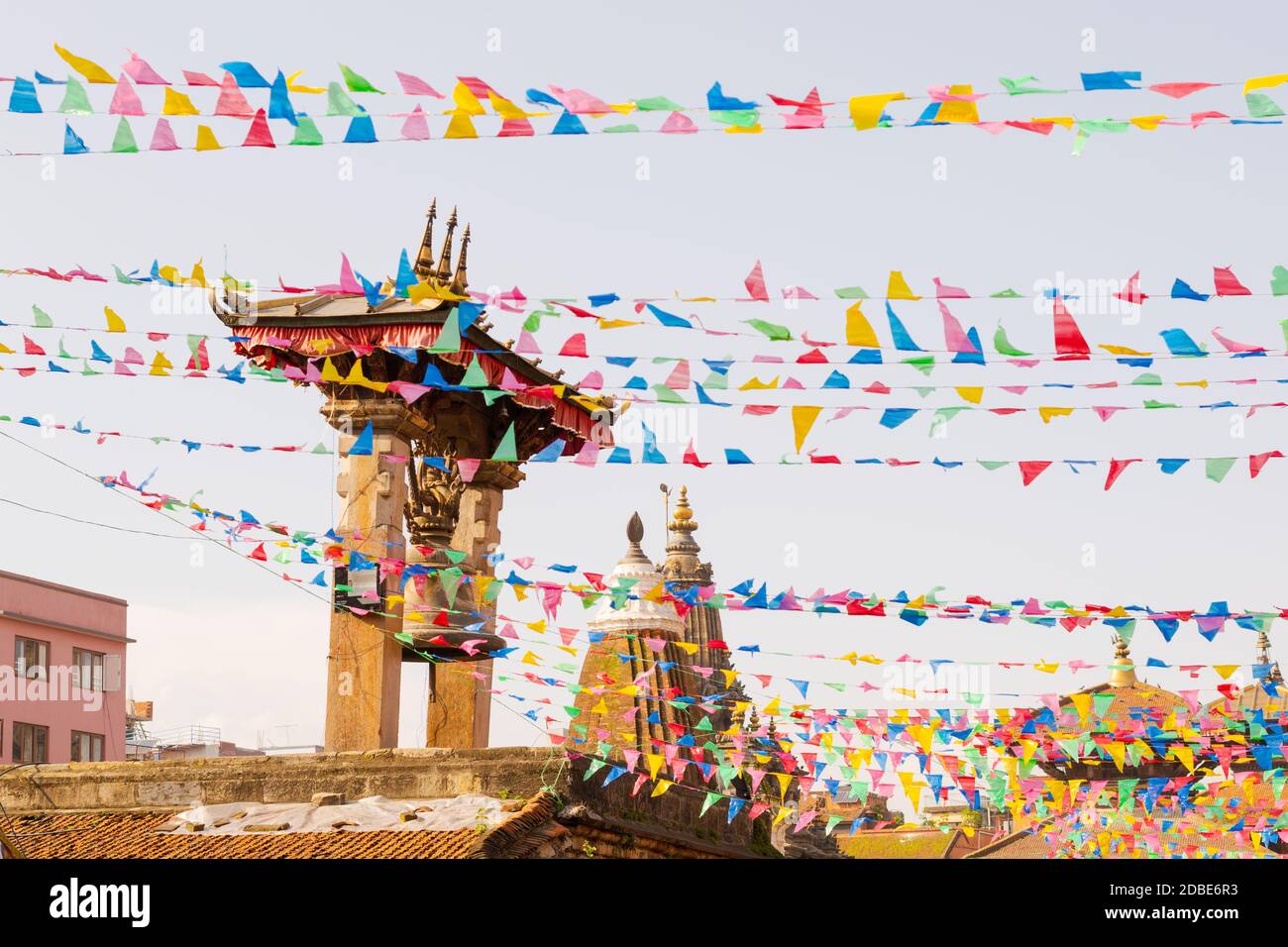 Prayer flags and decorations are held over Patan Durbar Square in ...