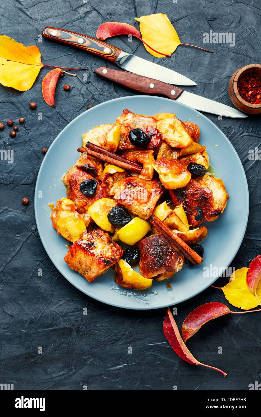 Delicious baked meat stew in apples.Autumn food Stock Photo - Alamy