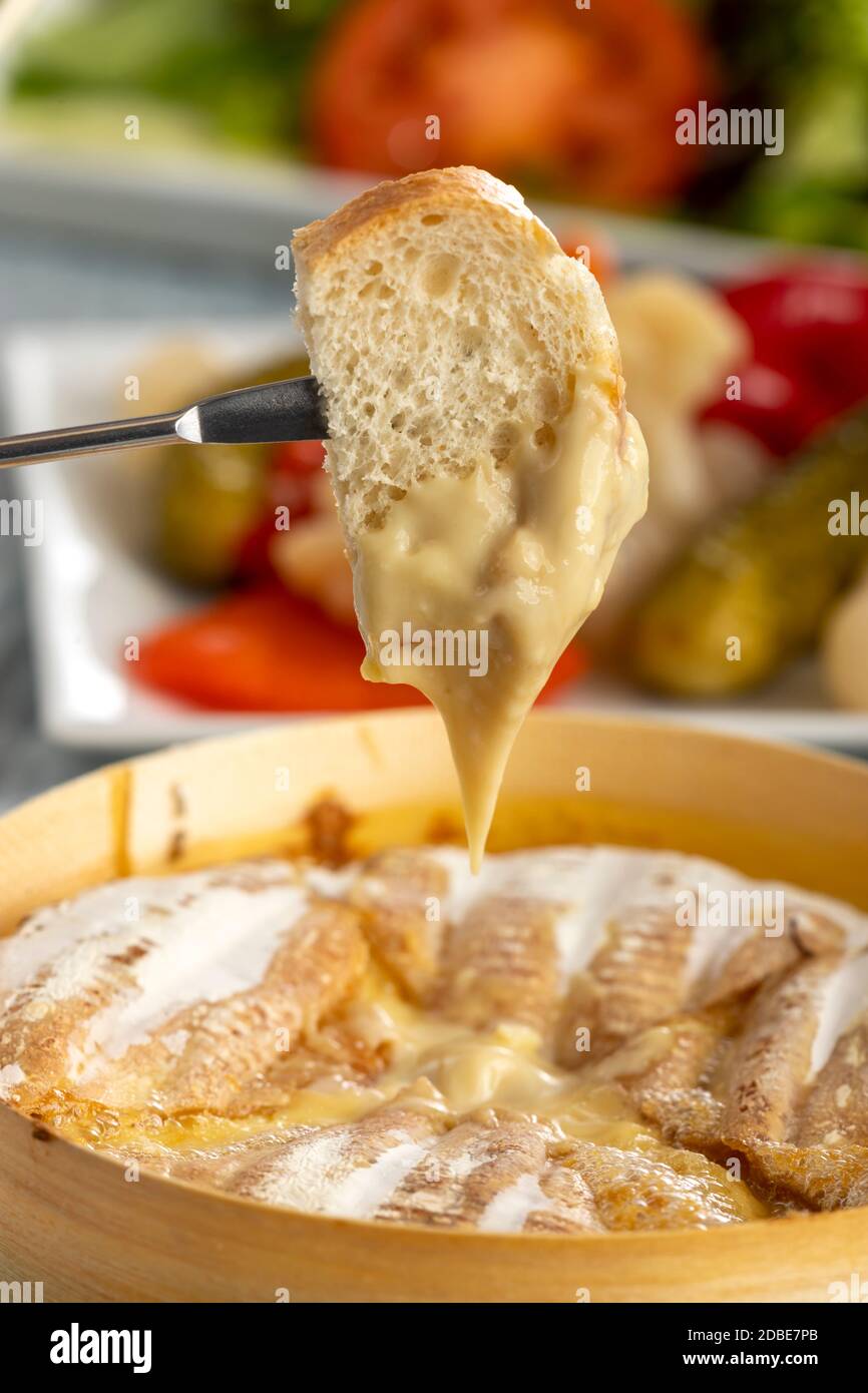 swiss cheese fondue with bread Stock Photo - Alamy