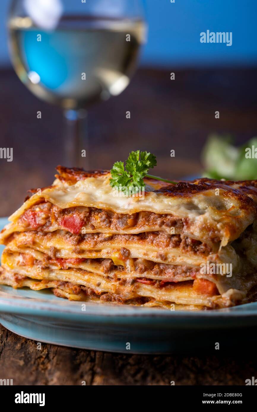portion of fresh lasagna on a plate Stock Photo - Alamy