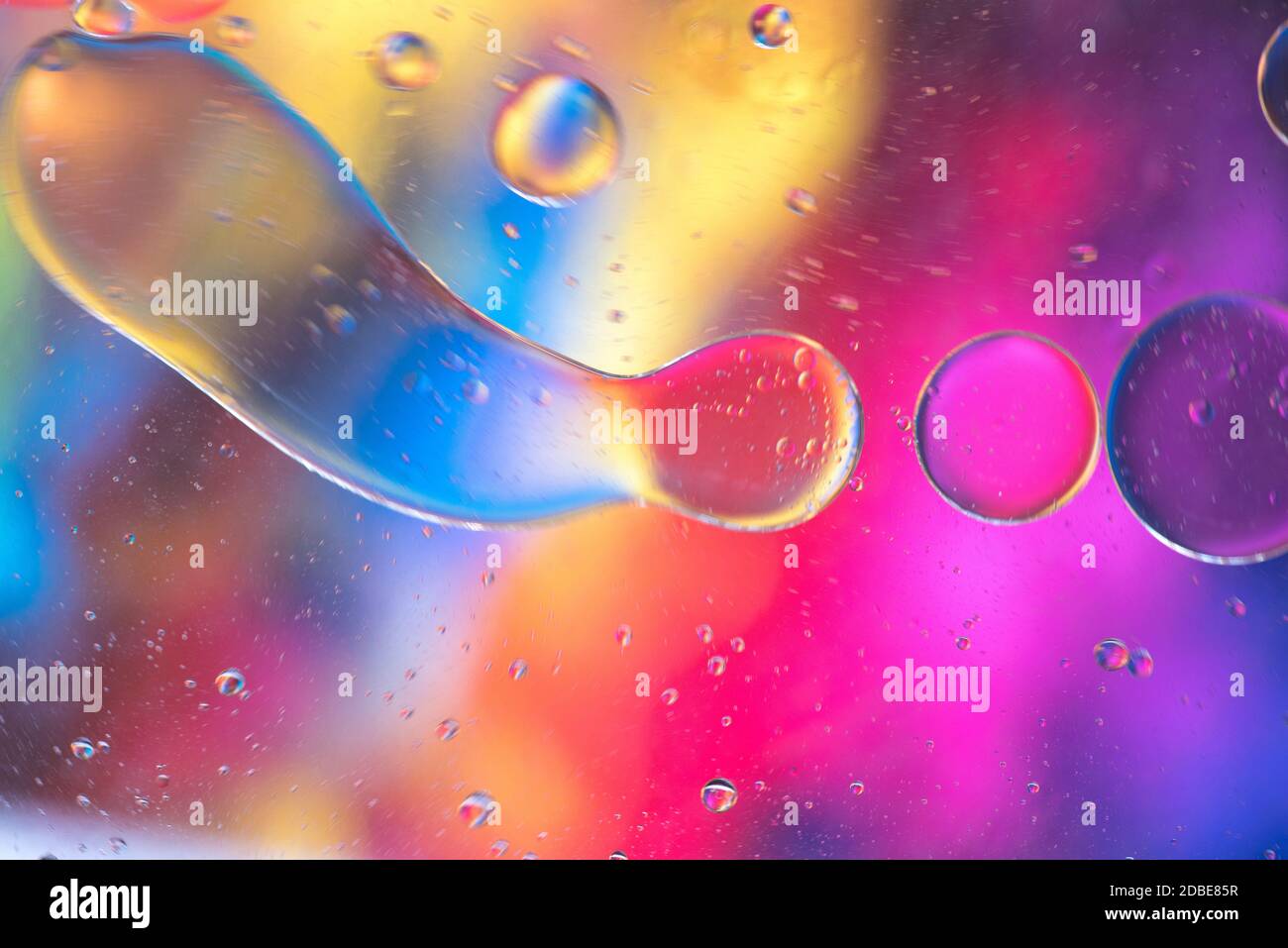 Oil drops in water. Abstract psychedelic pattern image rainbow colored ...