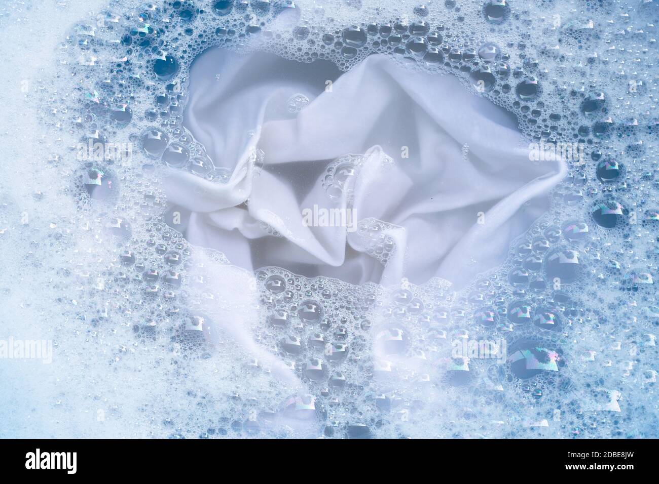 Top view of soak a cloth before washing, white cloth Stock Photo - Alamy
