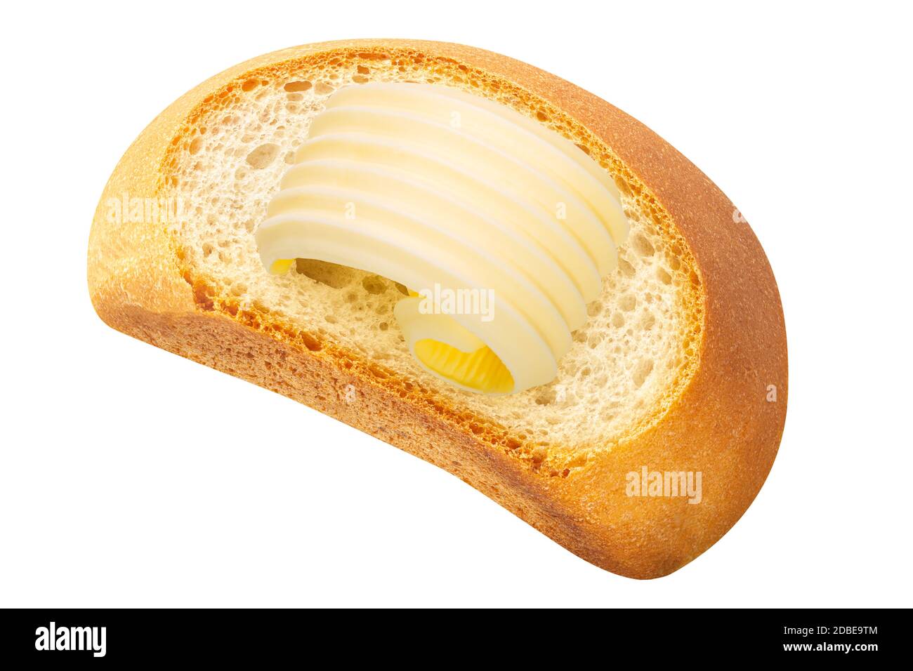 Bread baguette slice with butter curl atop, isolated, top view Stock ...