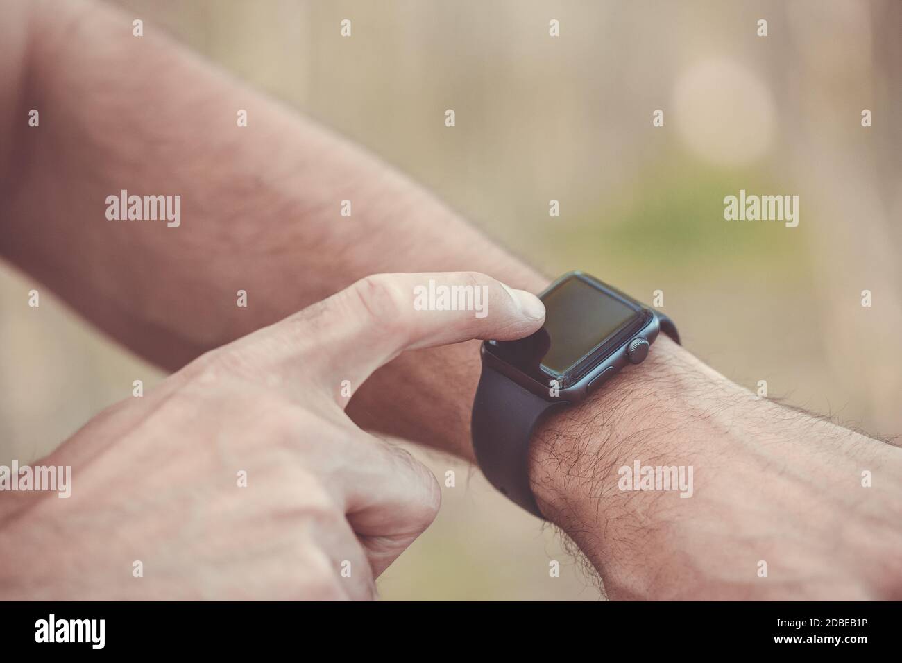 Man Pointing At Watch Sitting High Resolution Stock Photography and ...