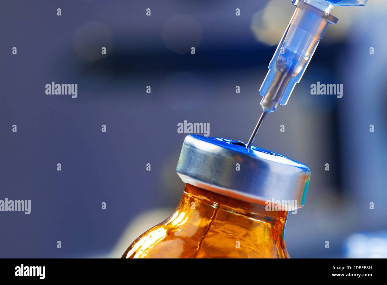Medical vial with medication and syringe close up Stock Photo - Alamy
