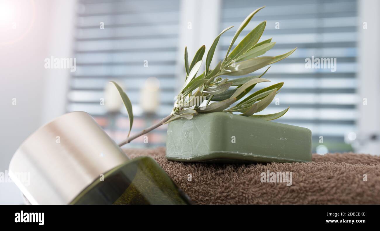 Natural olive hand soap. Bath accessories in a modern setting for a ...