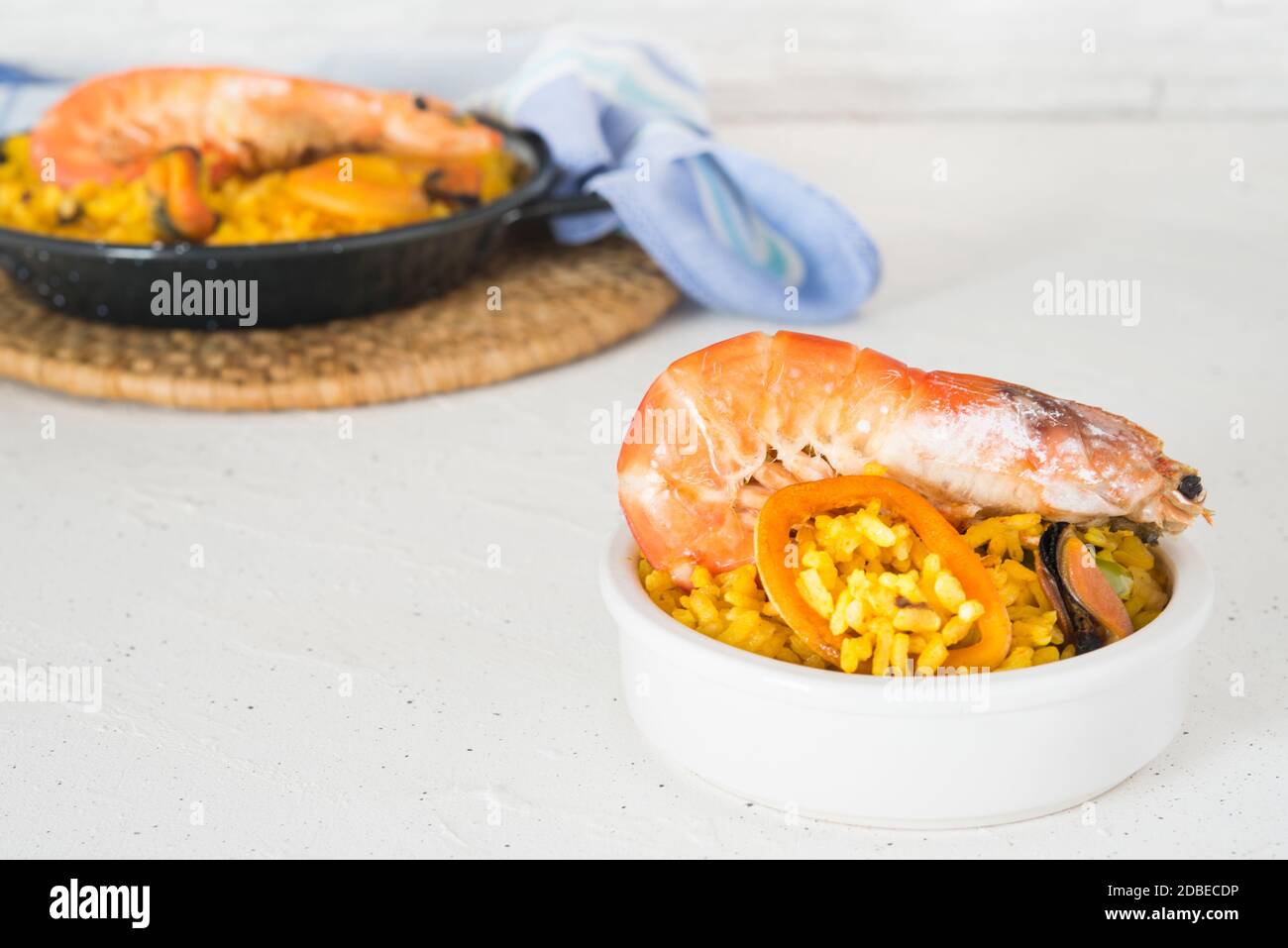 Paella typical spanish food in granite background Stock Photo - Alamy