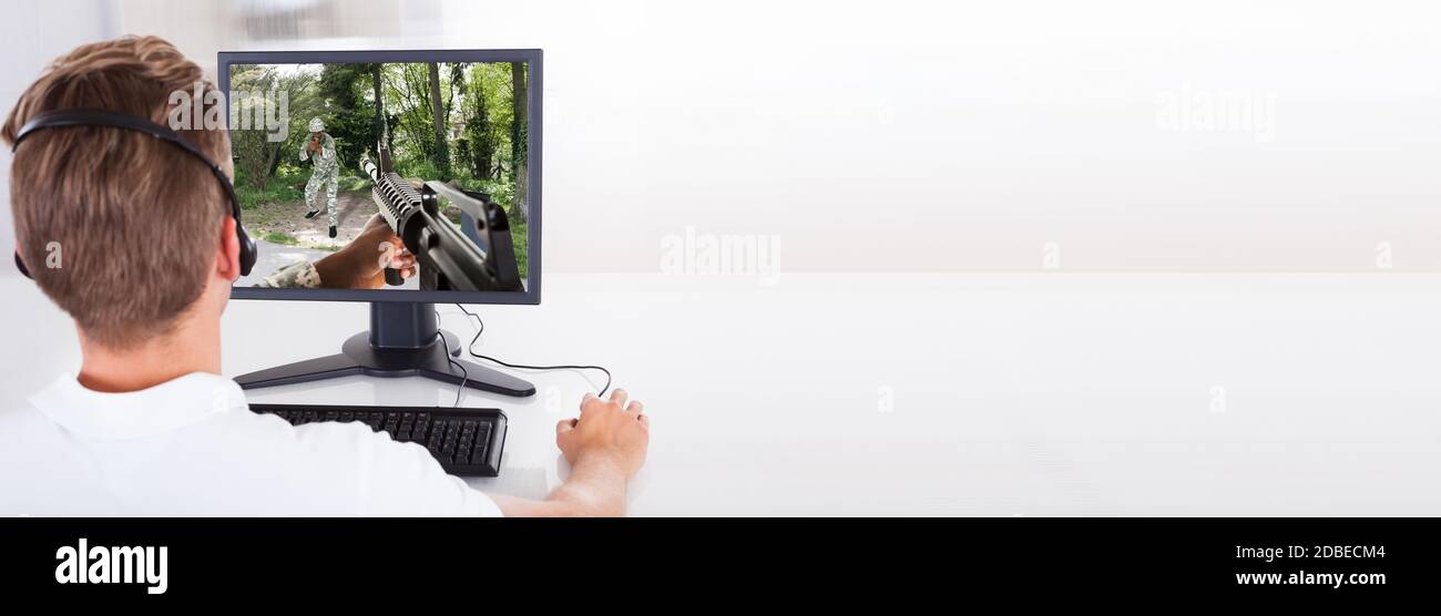 Man Playing Online Game On PC Computer Stock Photo - Alamy