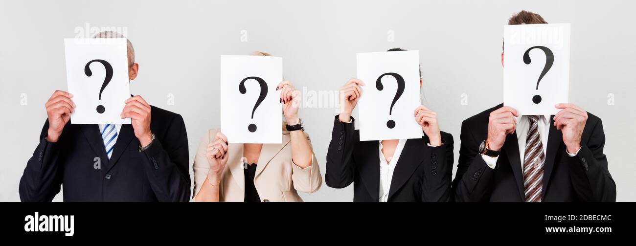 Group Business People Behind Question Mark Mystery Sign Stock Photo - Alamy