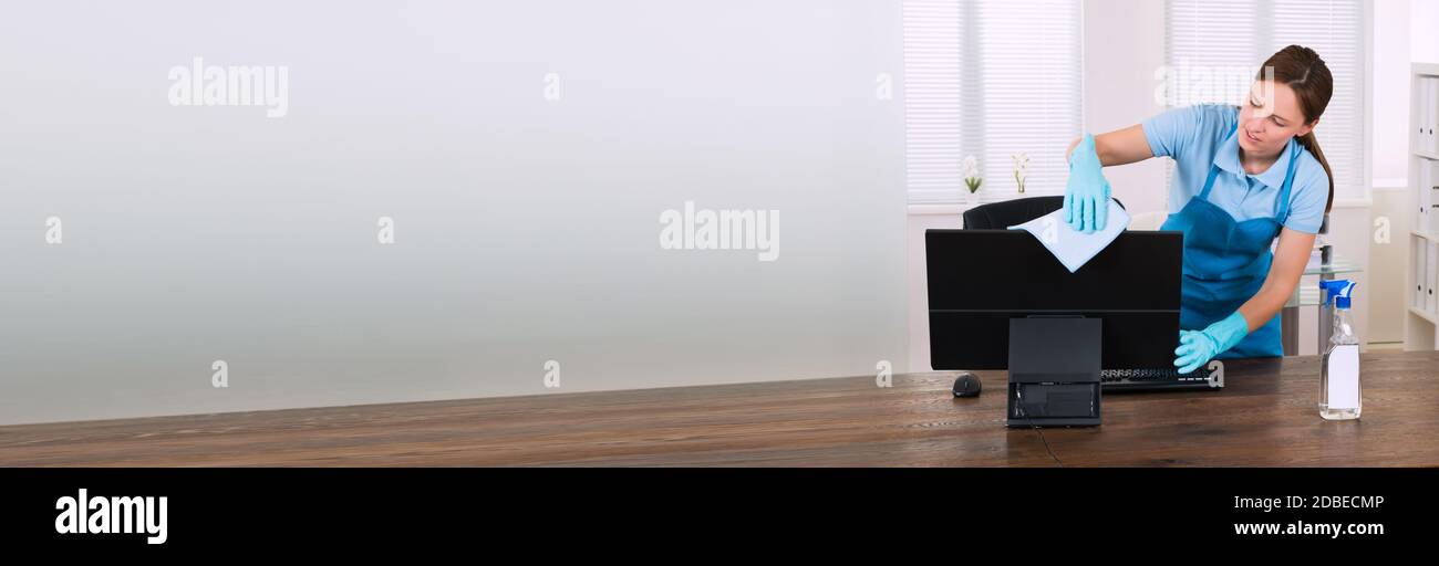 Woman Cleaning Office Computer. Professional Janitor Service Stock ...