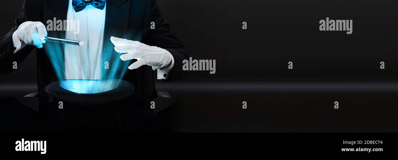 Magician Man Holding Magic Wand Doing Performance With Hat Stock Photo ...