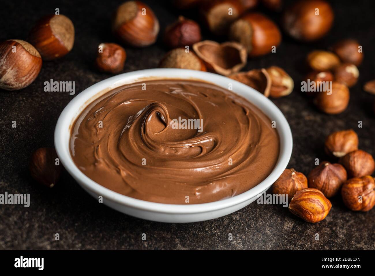 Sweet hazelnut spread. Chocolate cream in bowl Stock Photo - Alamy